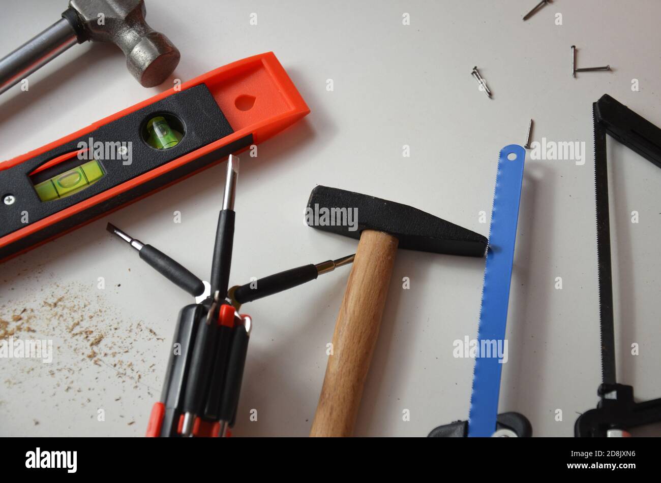 professional builder work with house renovation instruments on white ...
