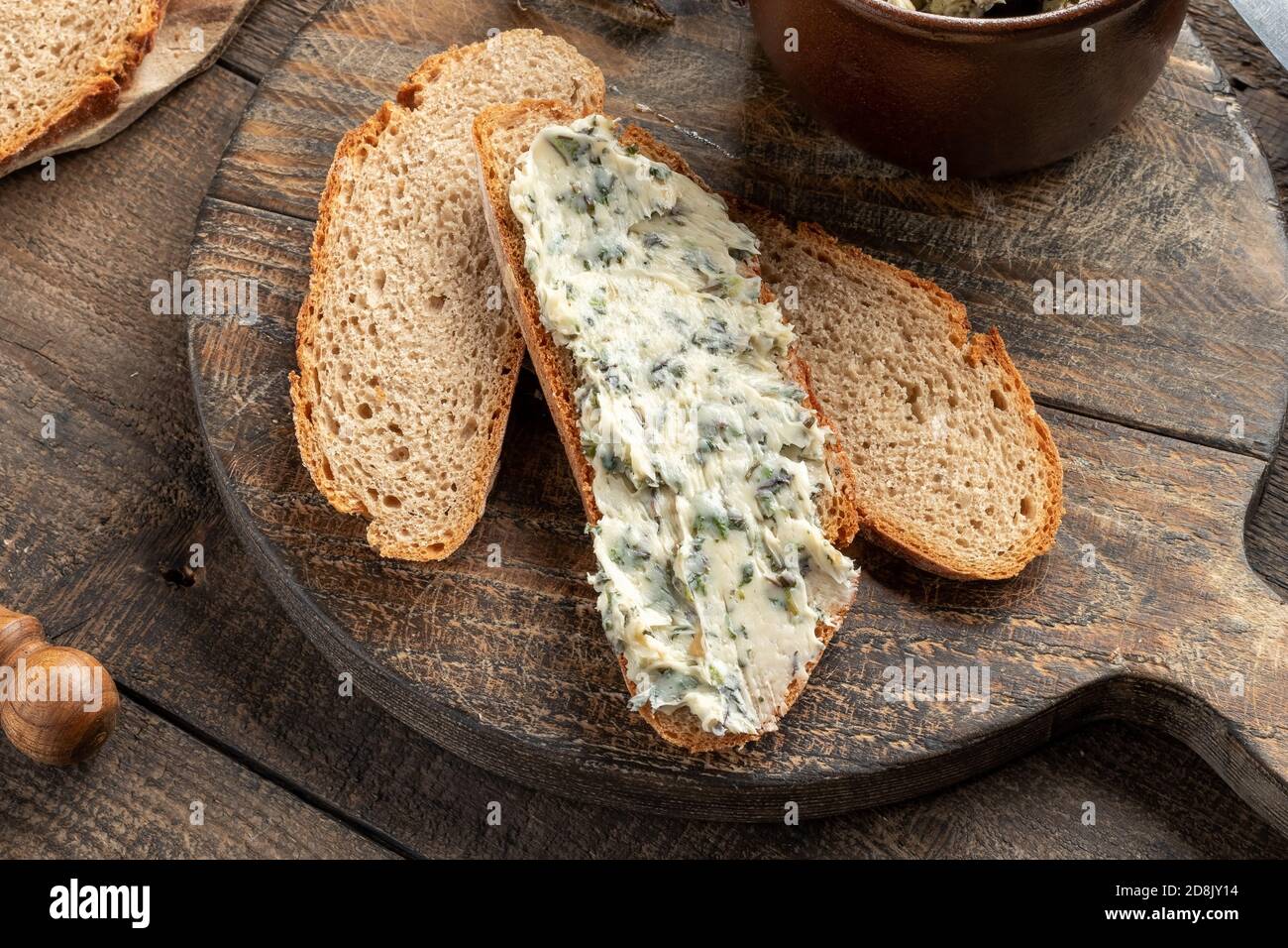 Nettle butter on a slice of bread on a table, top view Stock Photo - Alamy
