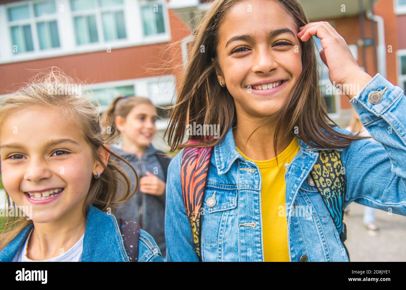 group of kids on the school background having fun Stock Photo - Alamy