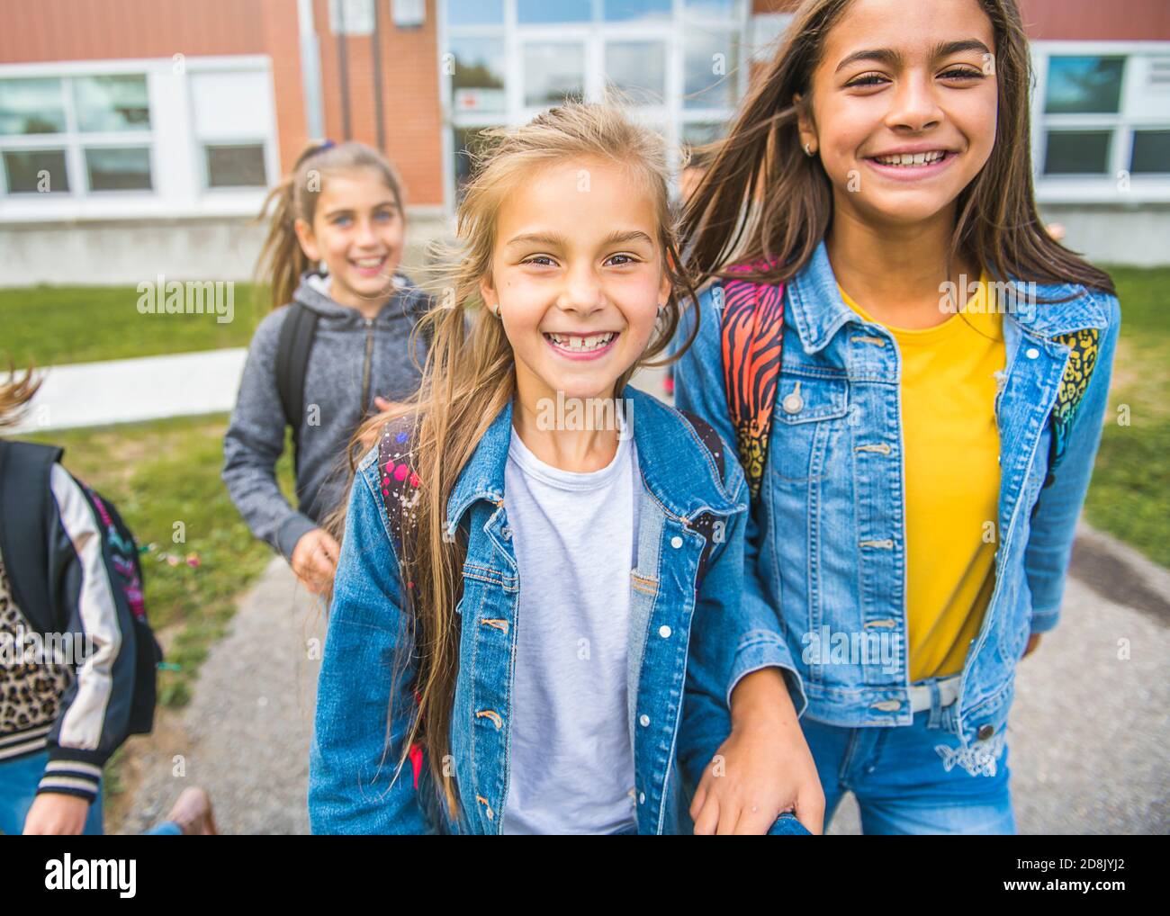 group of kids on the school background having fun Stock Photo - Alamy