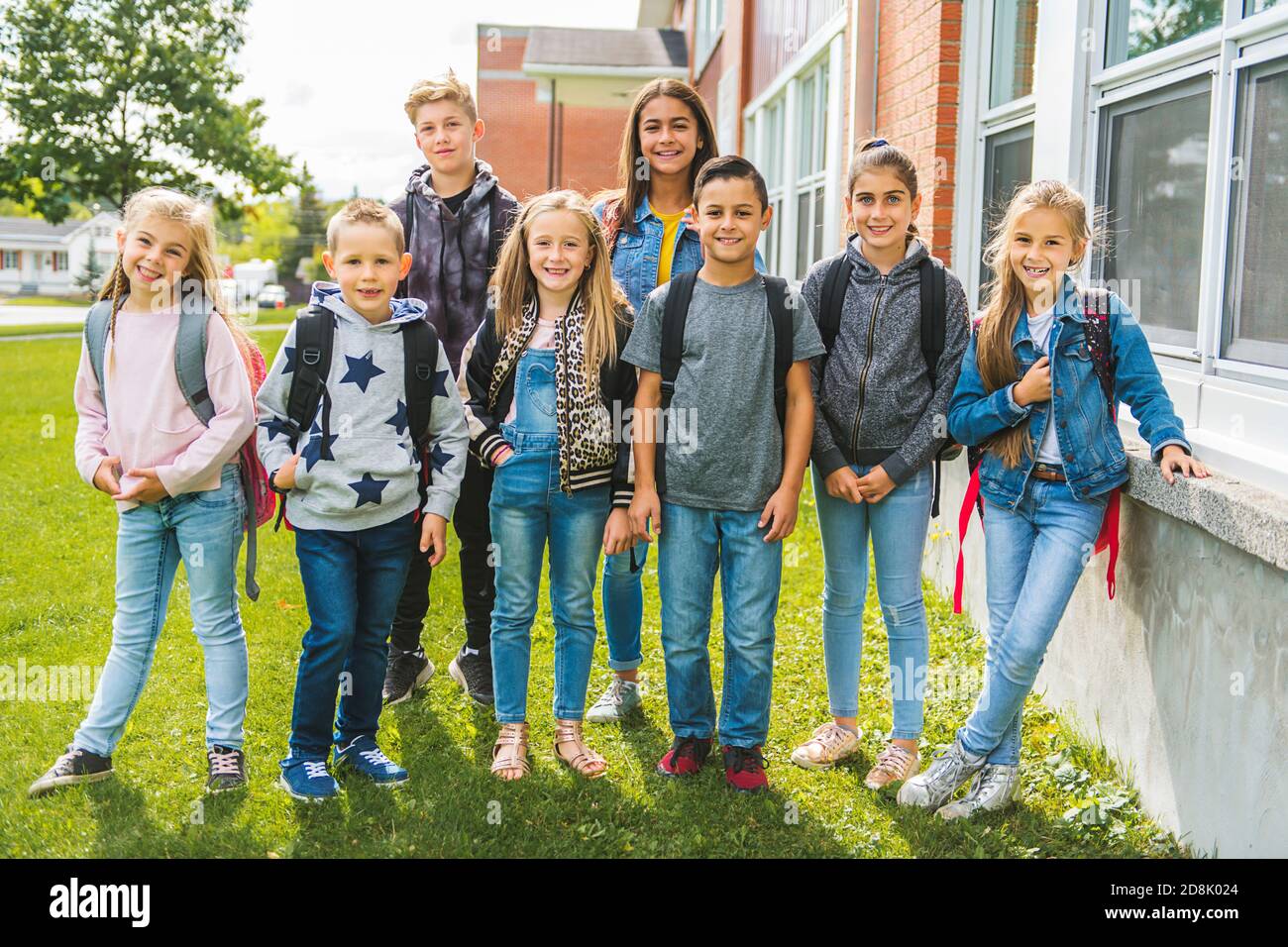 group of kids on the school background having fun Stock Photo - Alamy