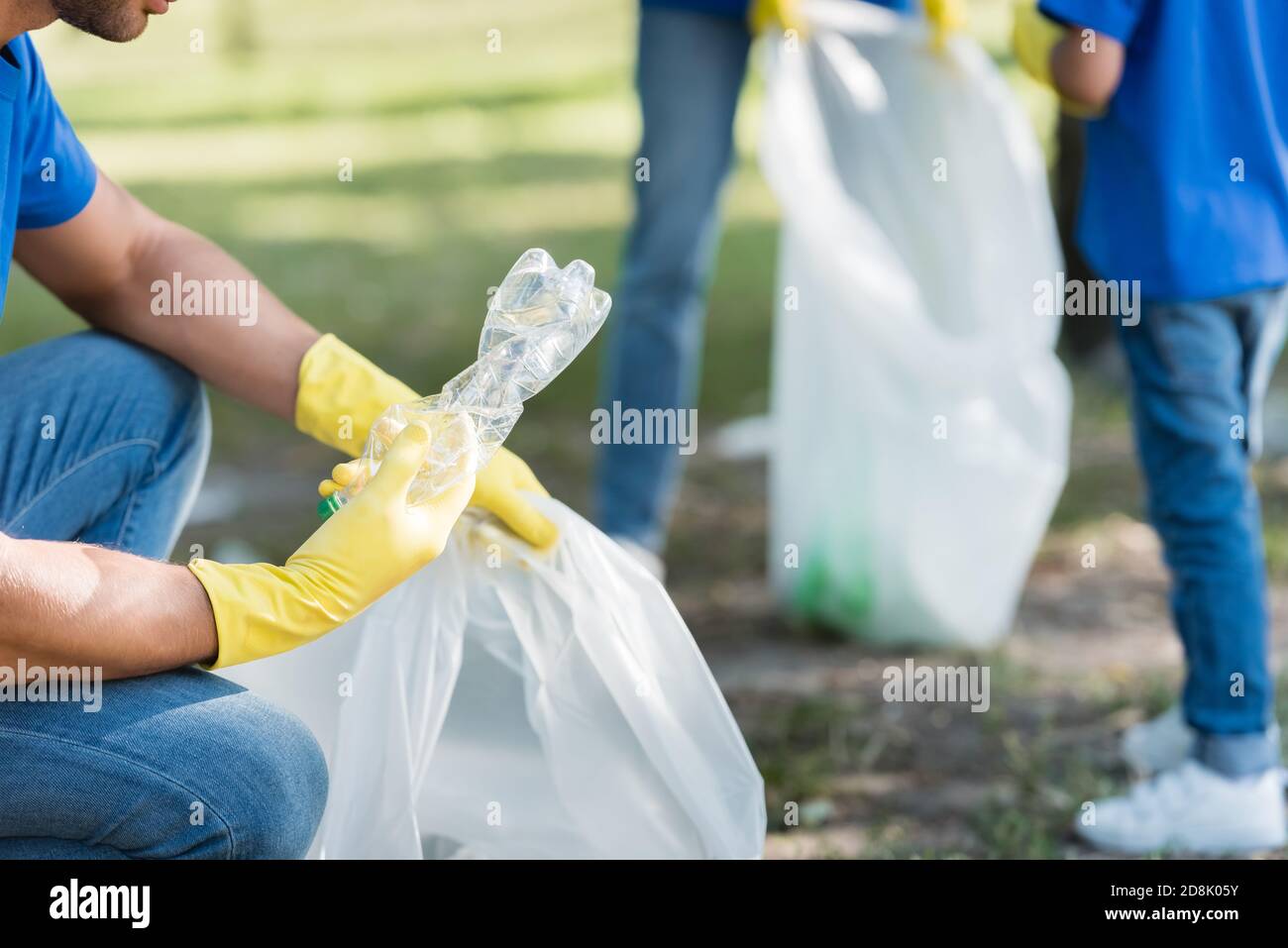 Plastic pollution man woman kid hi-res stock photography and images - Alamy