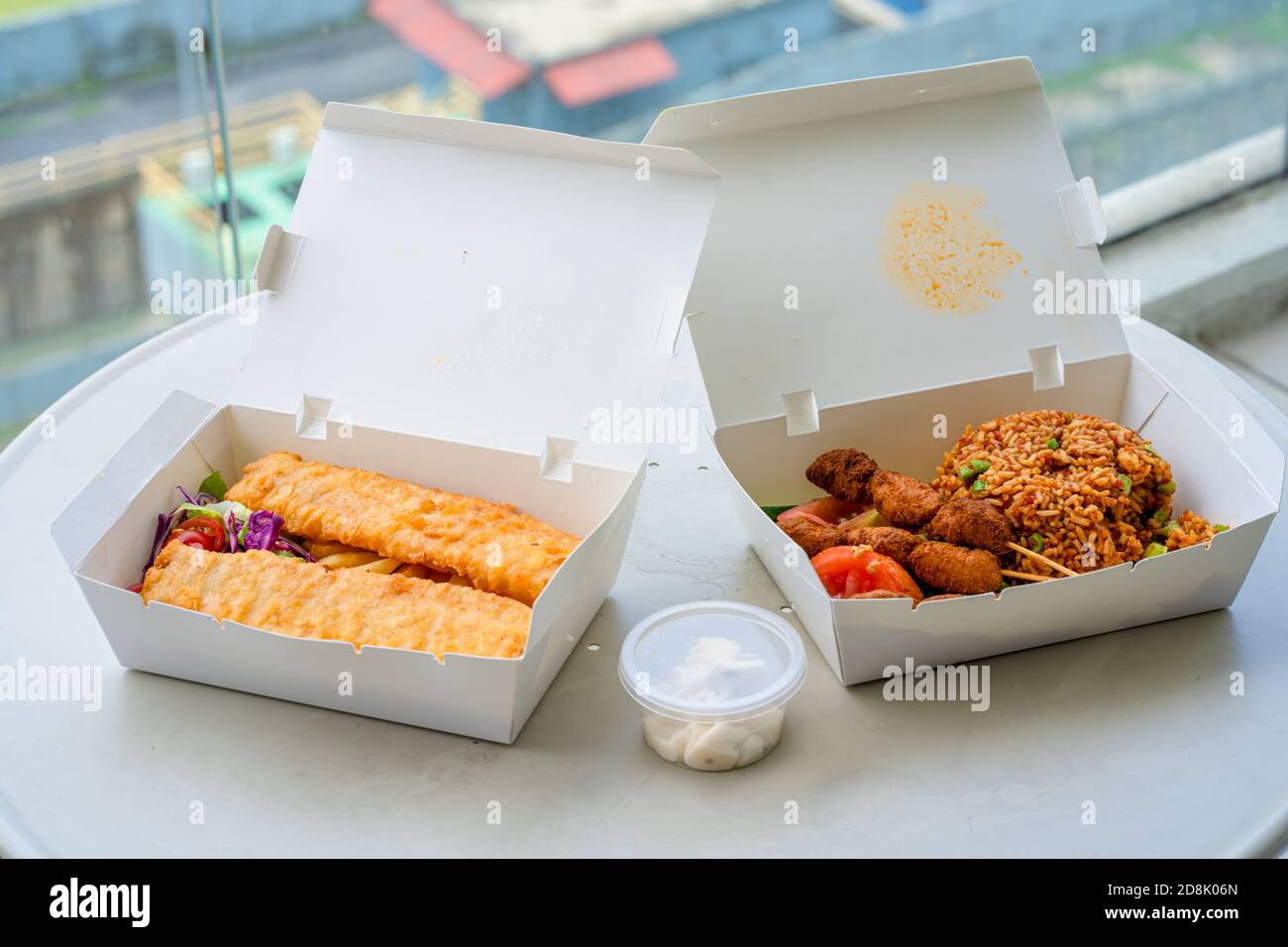 Cardboard boxes with hot food to go. Food delivery Stock Photo - Alamy