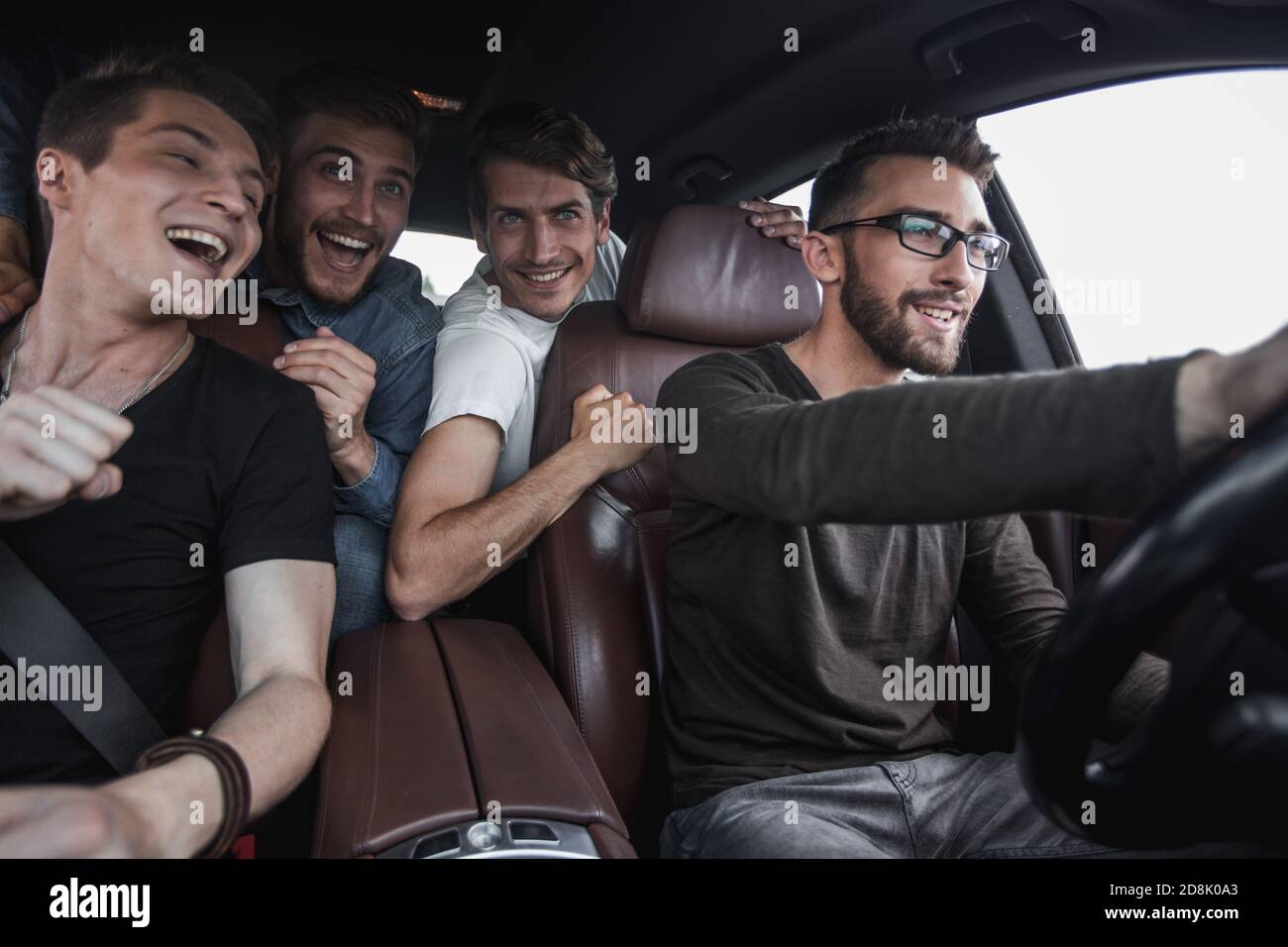 close up.happy friends talking in the car Stock Photo - Alamy