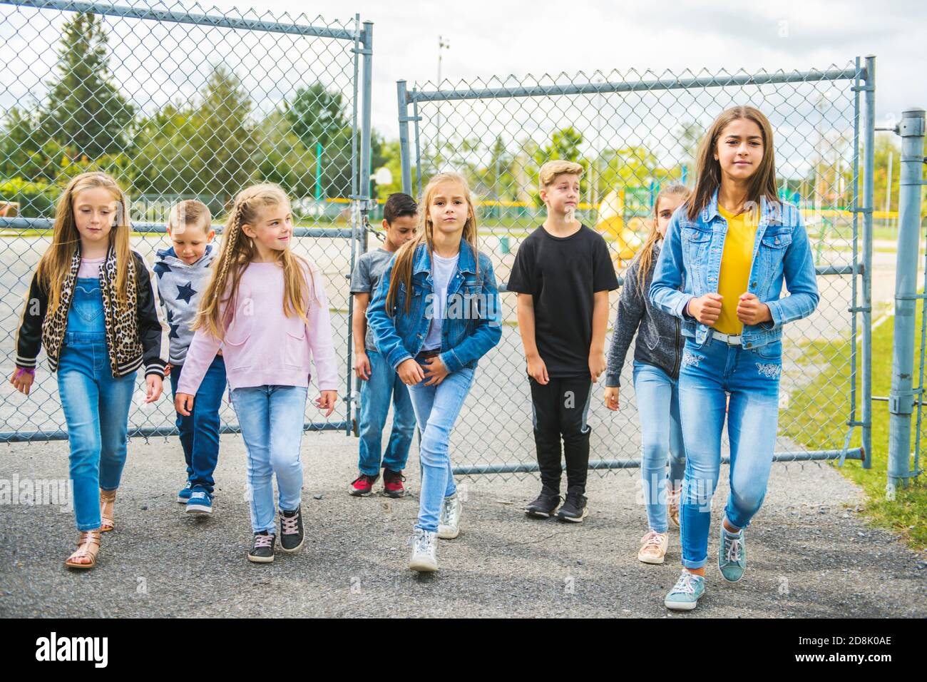 Some nice kids on the school background on day time Stock Photo - Alamy