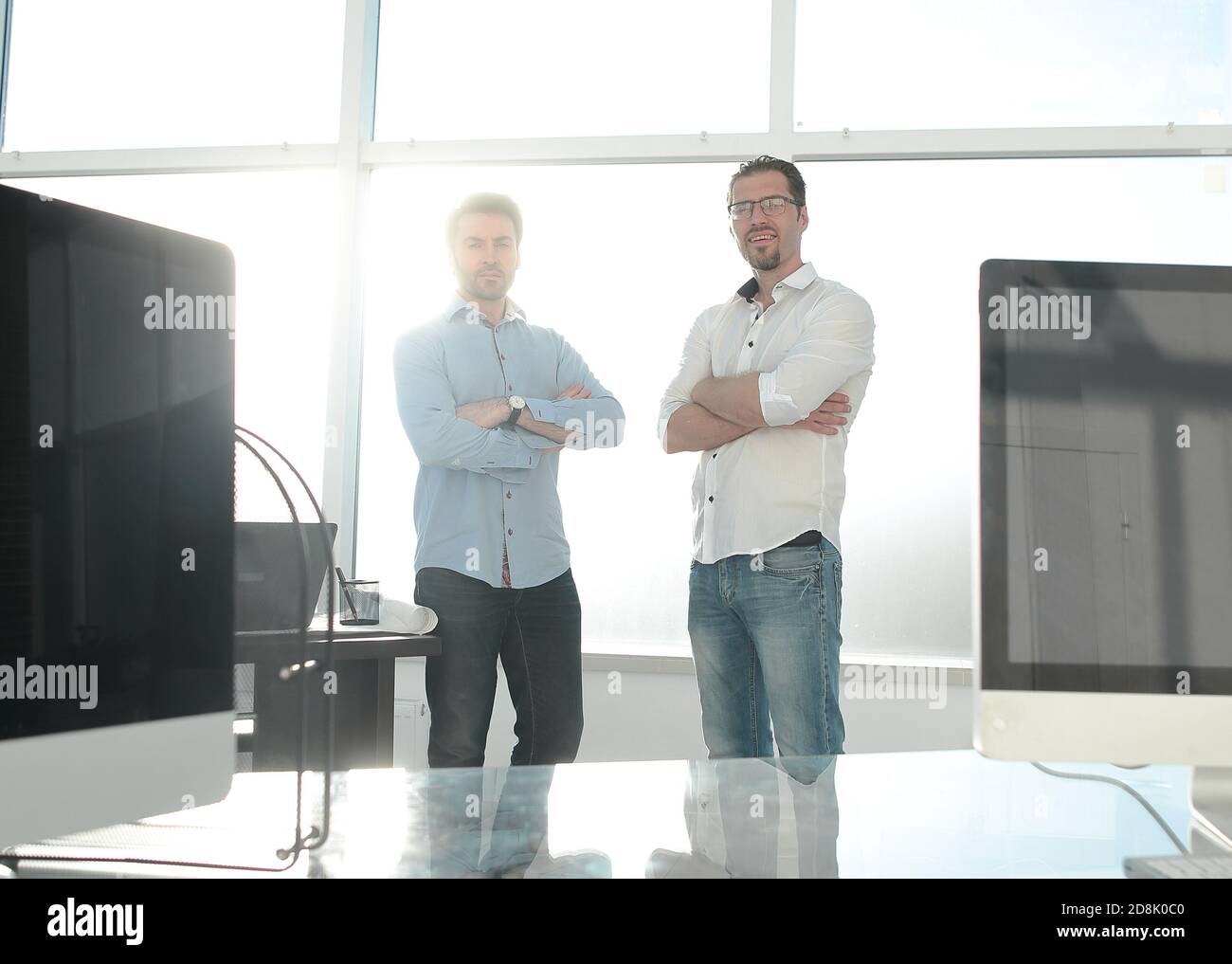 business background.two employees standing in a modern office Stock ...