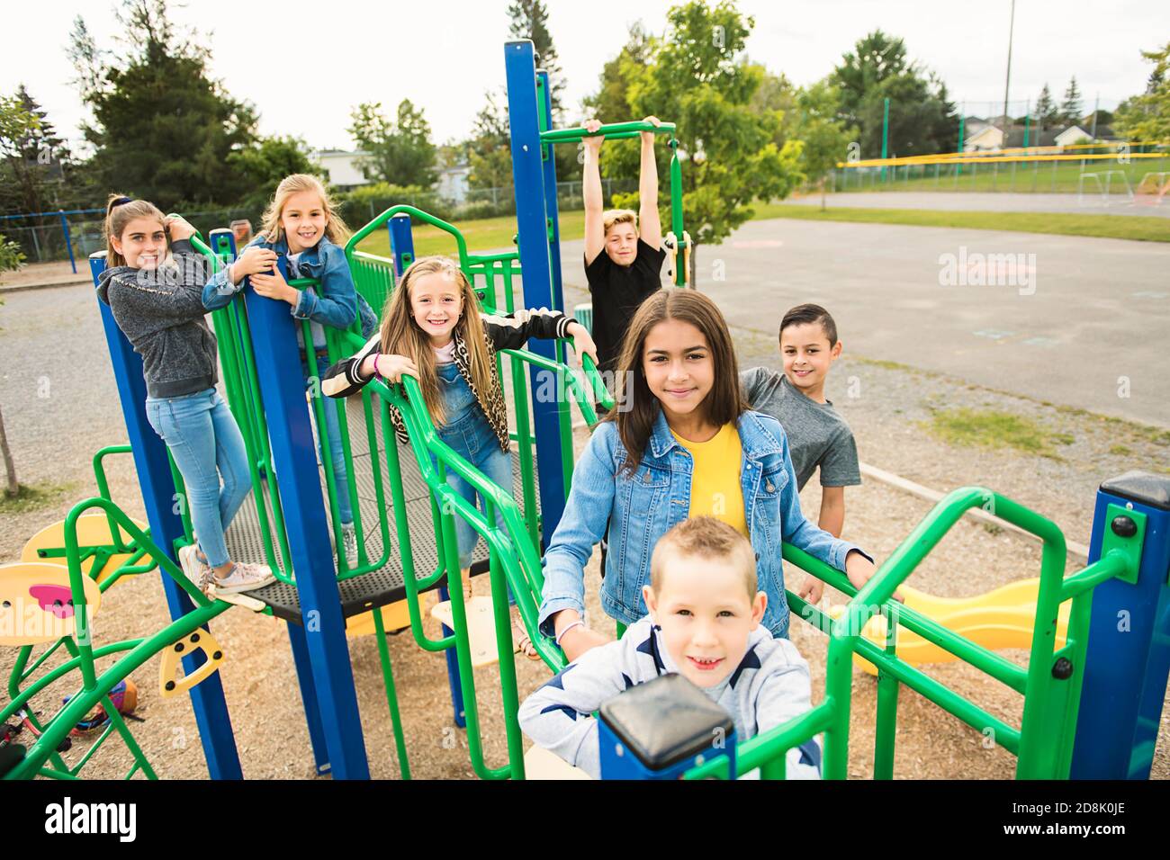 A group of Happy childrens play on the school playground Stock Photo ...