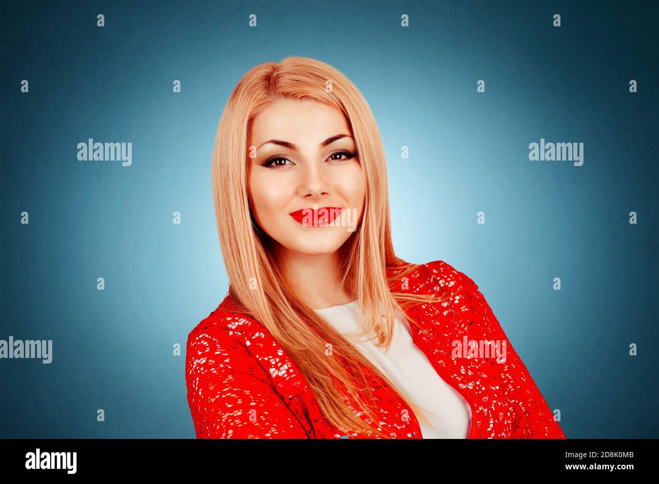 Portrait of a beautiful girl blonde wearing red lace jacket and white ...
