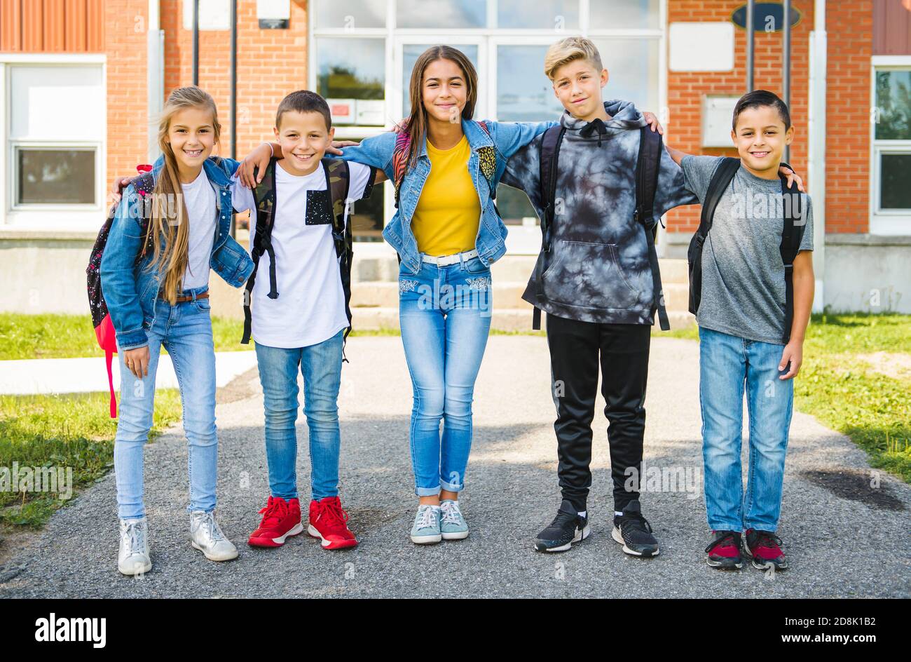 group of kids on the school background having fun Stock Photo - Alamy