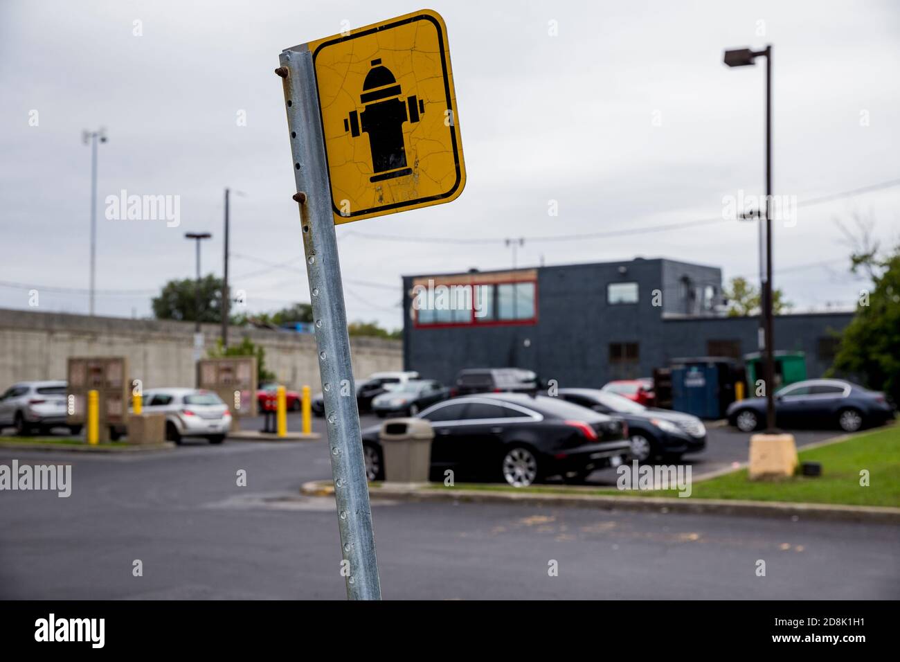 A fire hydrant sign near a parking lot in Longueuil, Quebec, Canada ...