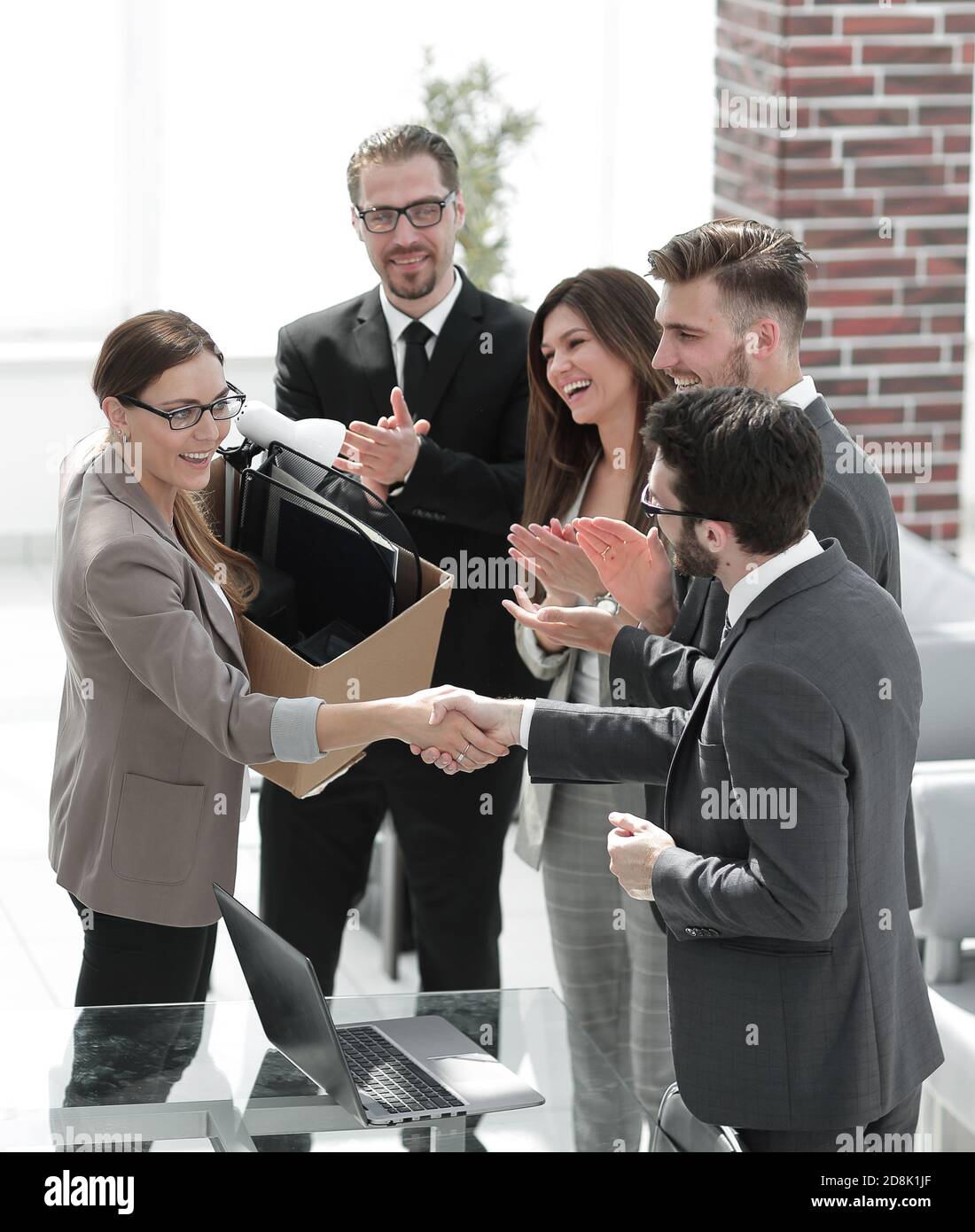 boss shaking hands with a new employee Stock Photo - Alamy