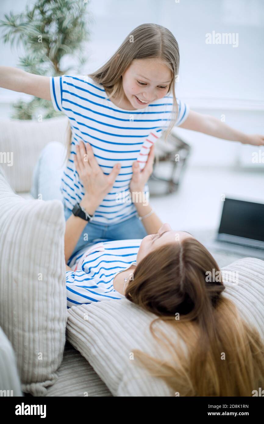 close up.happy mom and daughter play together Stock Photo - Alamy