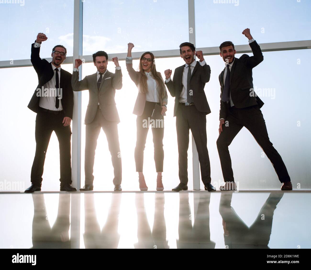 A group of people with great success holds Stock Photo - Alamy