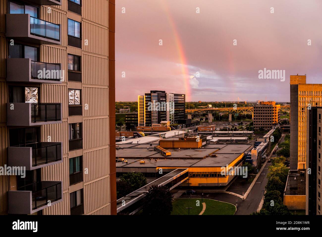Rainbow over office building in hi-res stock photography and images - Alamy