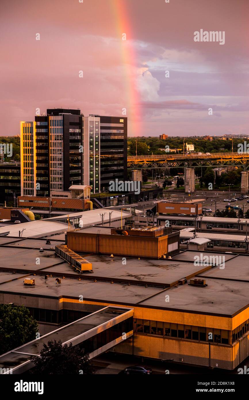 A rainbow over buildings in Longueuil, QC, Canada Stock Photo - Alamy