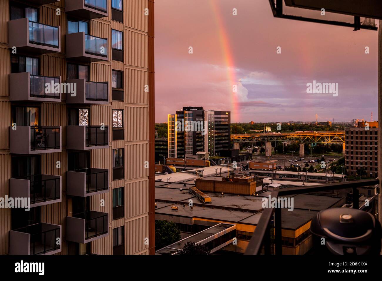 A rainbow over buildings in Longueuil, QC, Canada Stock Photo - Alamy