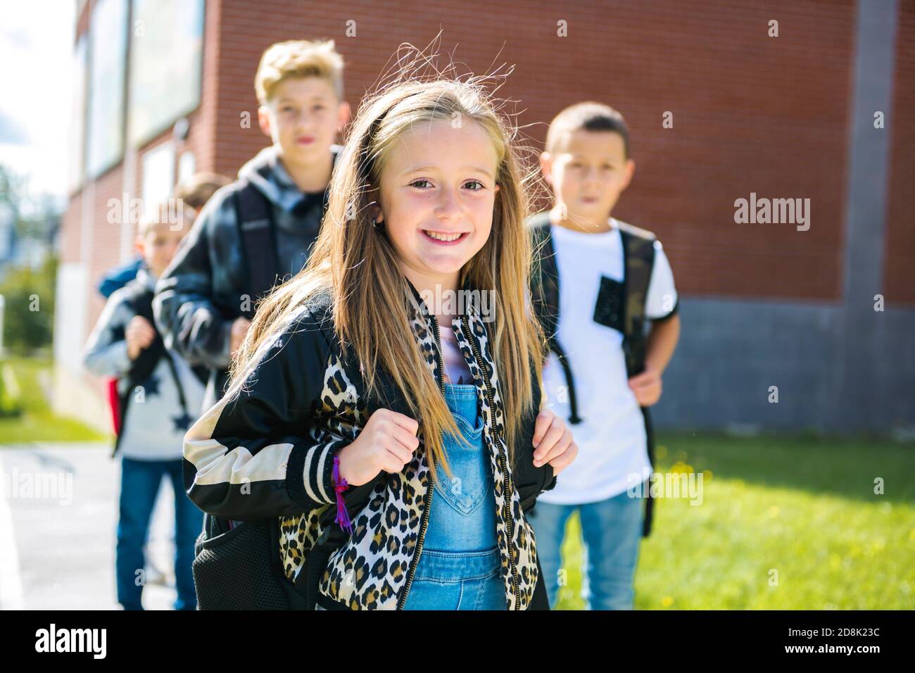 group of kids on the school background having fun Stock Photo - Alamy