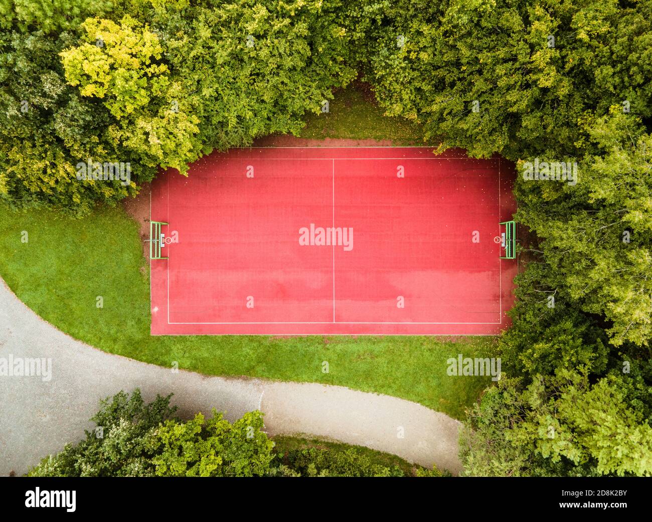 Top view of an outdoor basketball court surrounded by trees Stock Photo ...