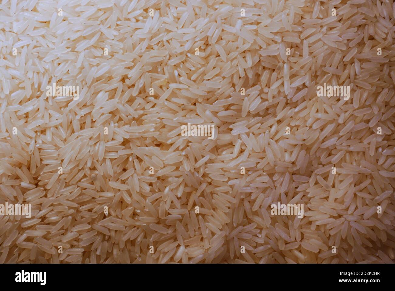 Image shows a close-up of white rice from above, with nothing else ...