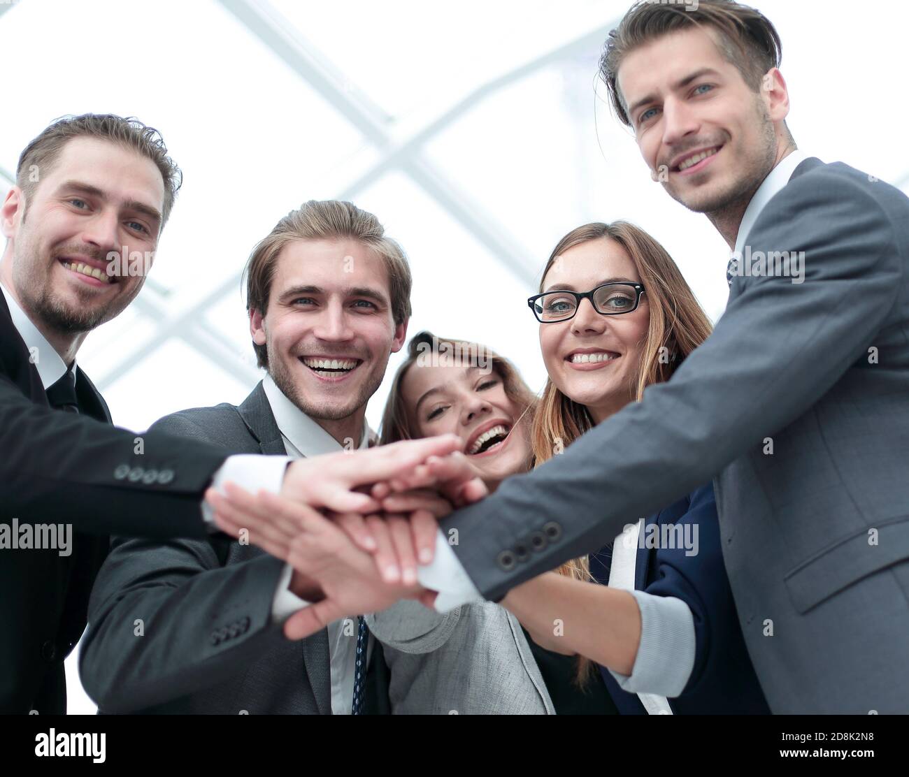 happy business team celebrating victory in office Stock Photo - Alamy