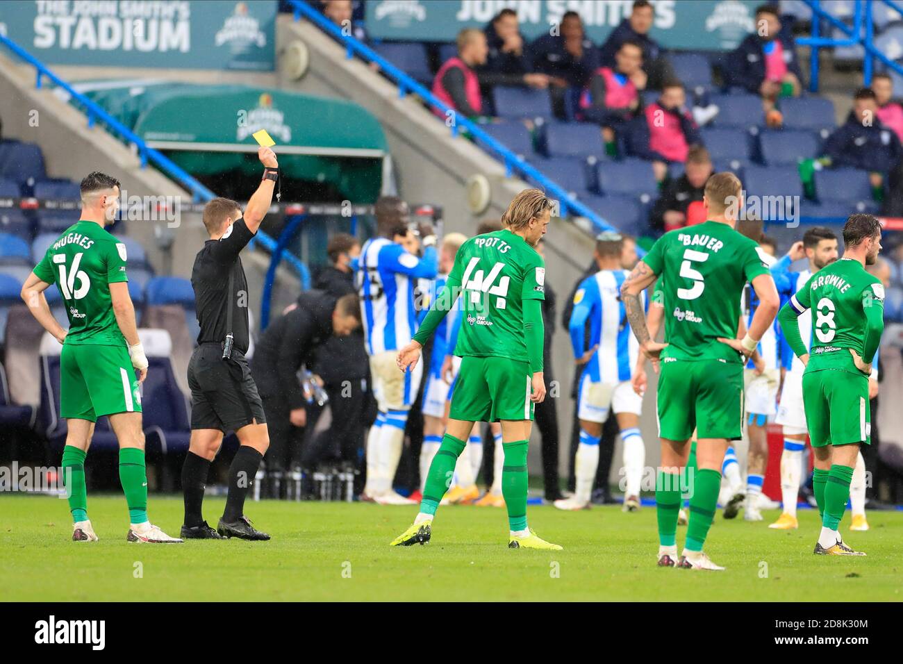 Brad Potts (44) of Preston North End is shown a yellow card Stock Photo ...