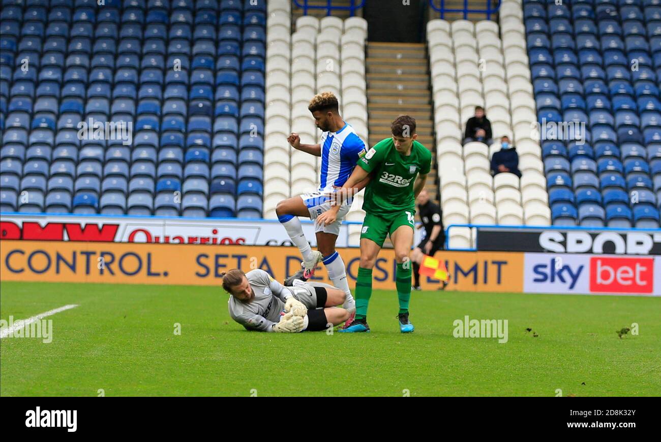 Declan Rudd (1) of Preston North End saves an effort at the feet of ...