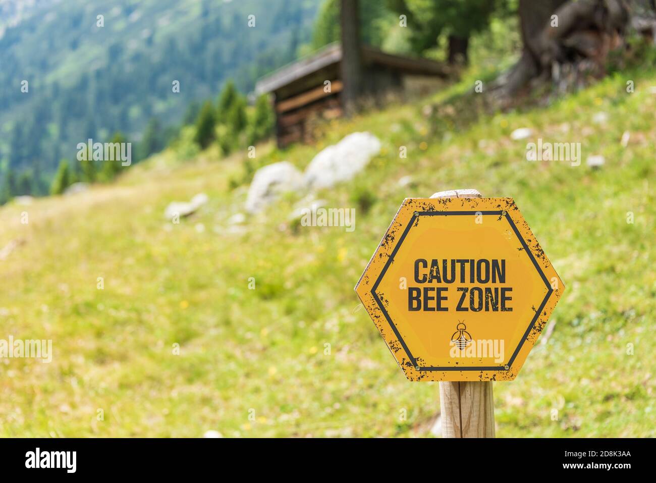Bee Zone Warning brightly coloured yellow and black warning sign on a ...