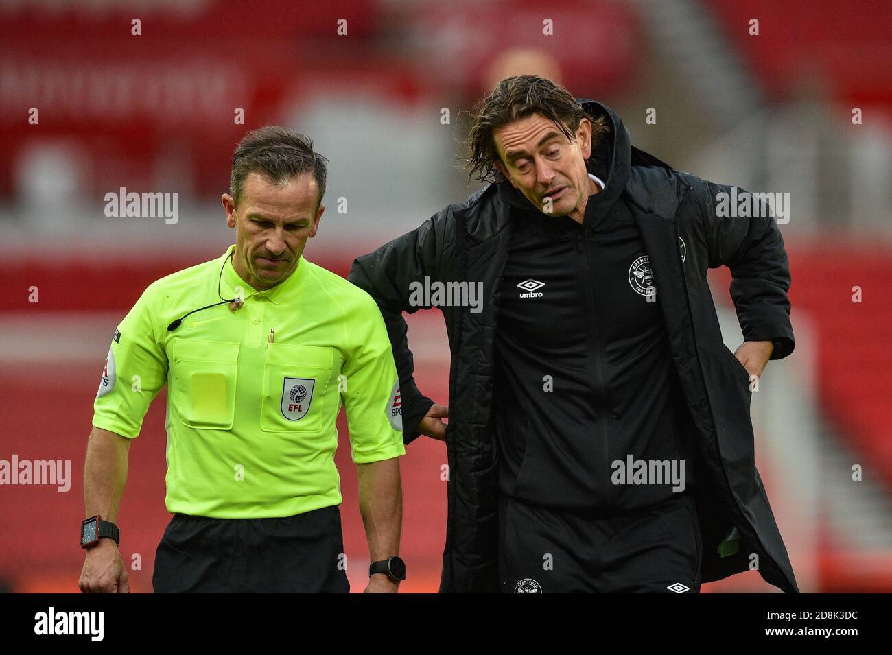 Thomas Frank manager of Brentford talks with Referee Keith Stroudasfter ...