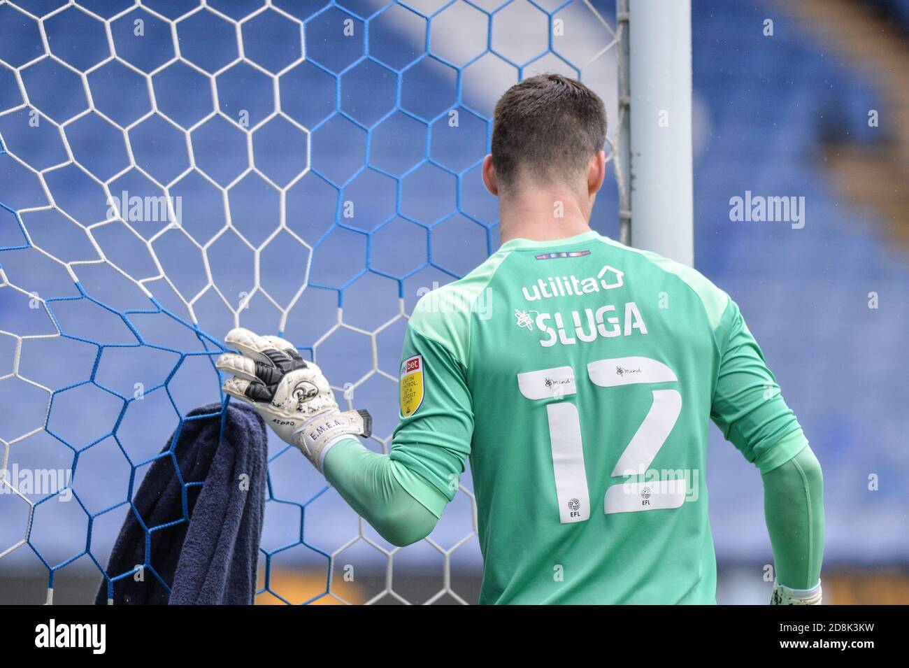 Simon Sluga (12) of Luton Town places towel prior to kick off Stock ...