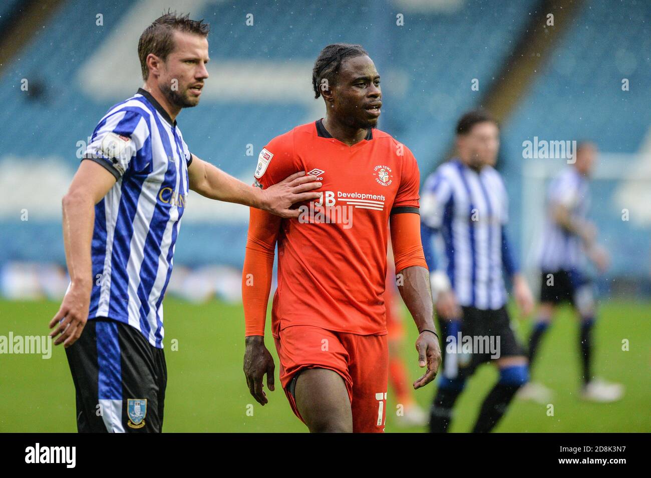 Julian Börner (13) of Sheffield Wednesday gets to grips with Pelly ...