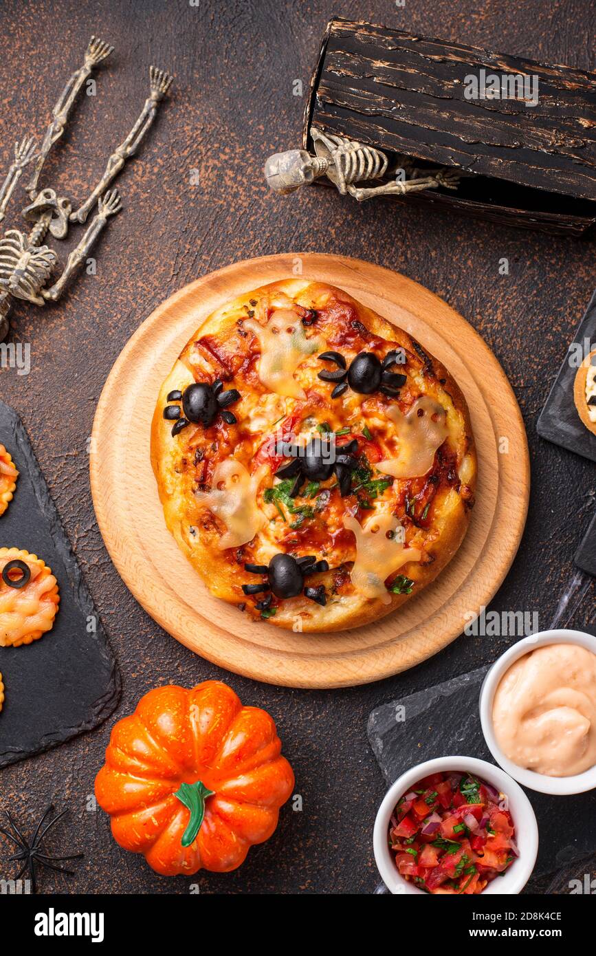 Halloween scary pizza decorated ghosts Stock Photo - Alamy