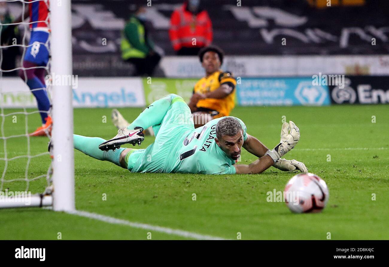 Crystal Palace goalkeeper Vicente Guaita watches the shot from ...