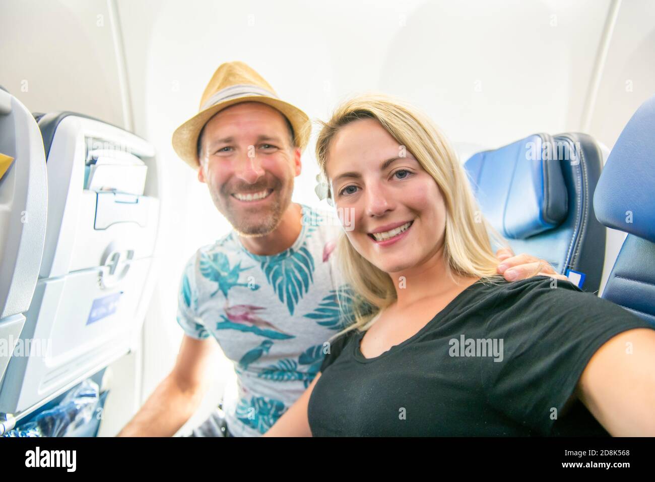 Couple flying business class hi-res stock photography and images - Alamy