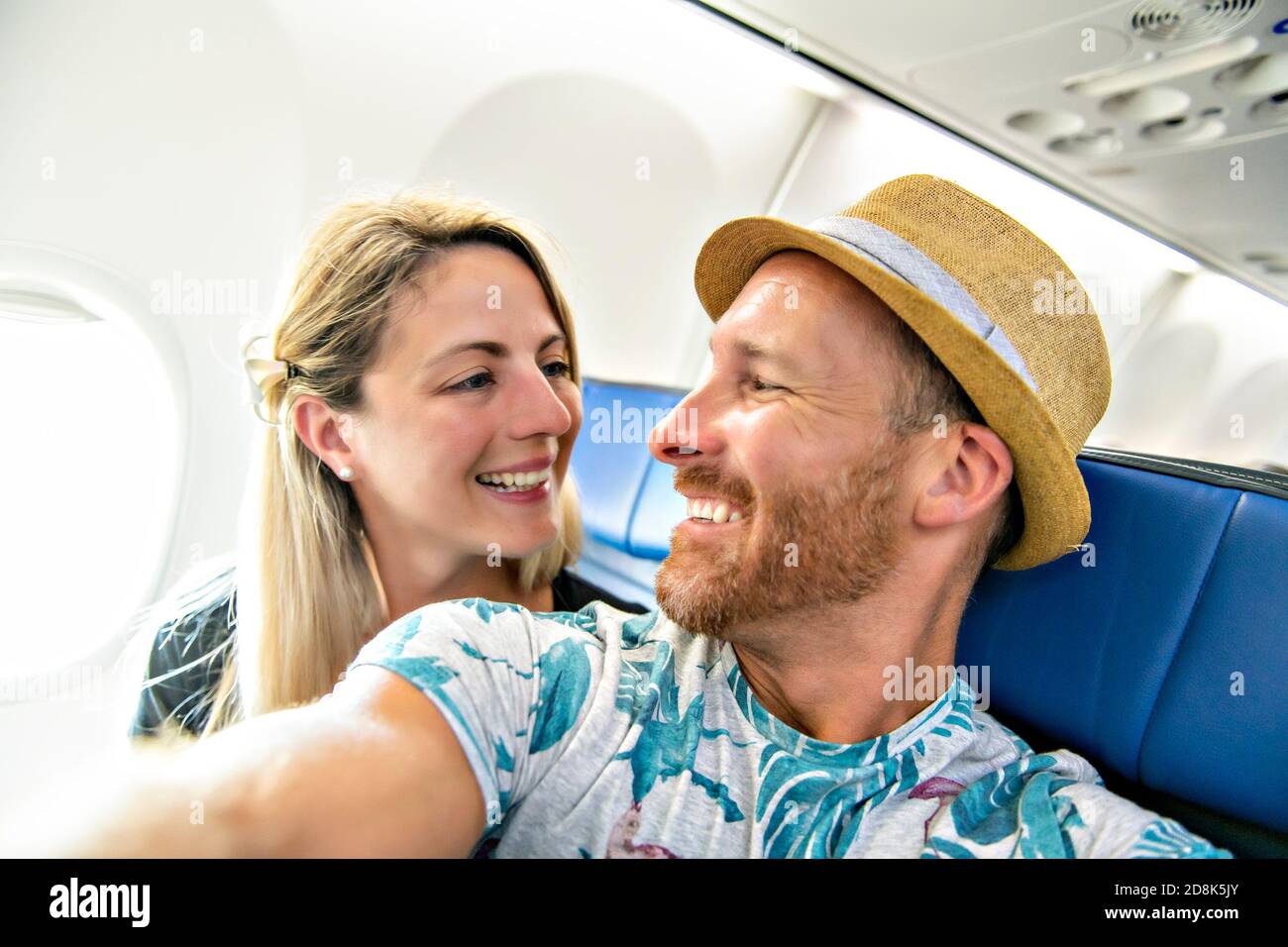 Couple flying business class hi-res stock photography and images - Alamy