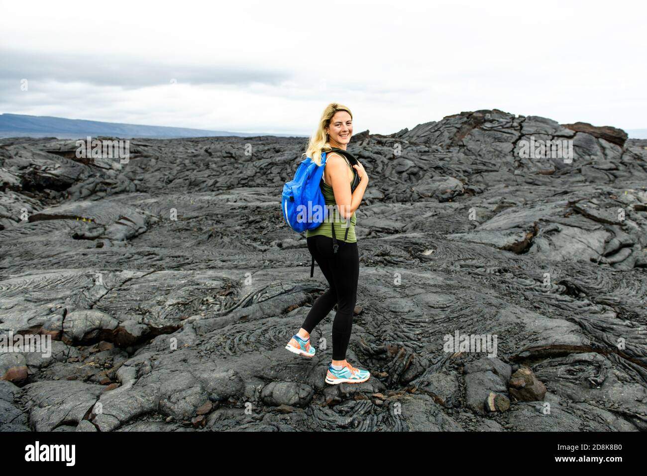 The Woman Tourist visiting the lava field at hawaii Stock Photo - Alamy