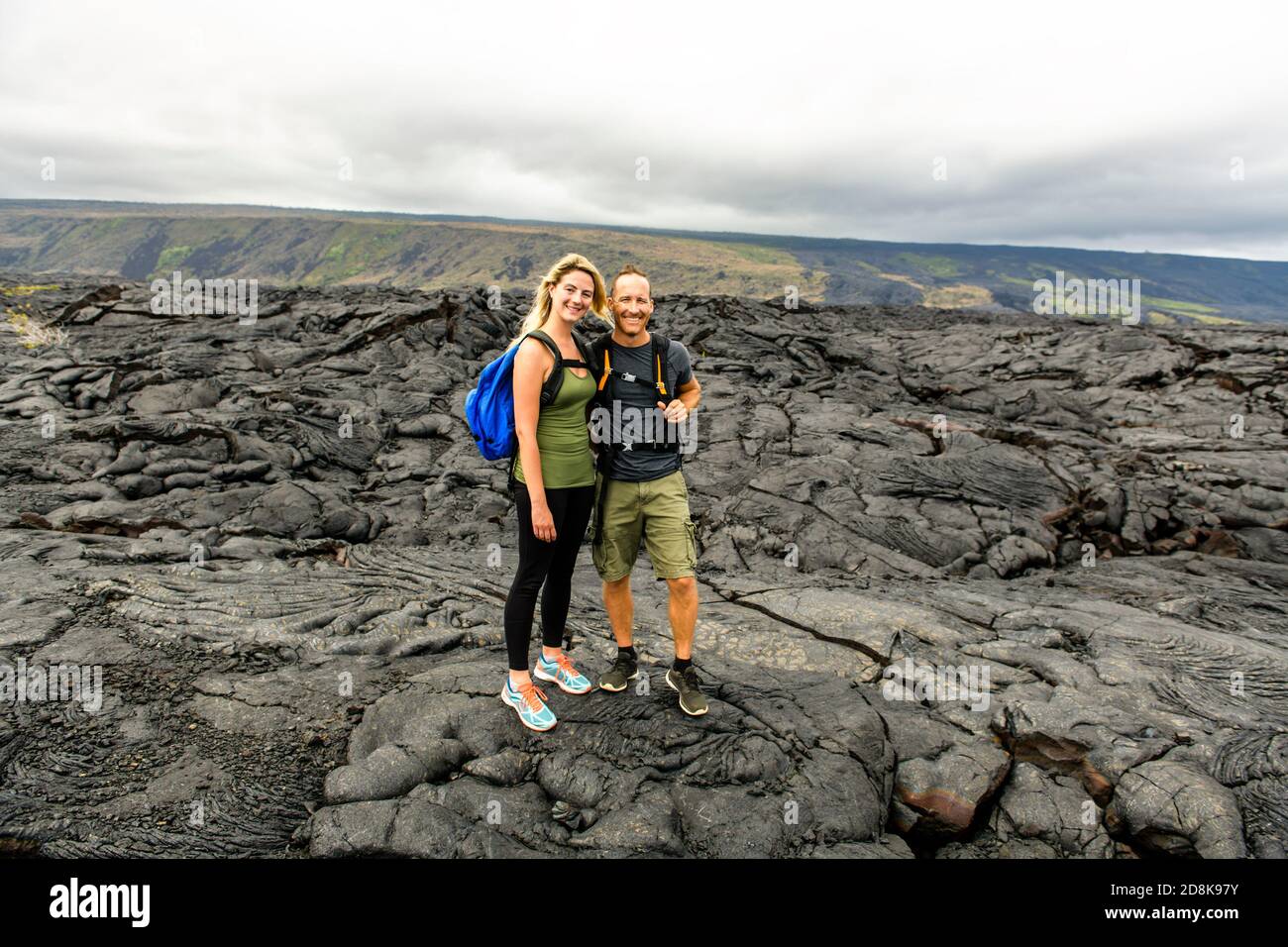 The couple Tourist visiting the lava field at hawaii Stock Photo - Alamy
