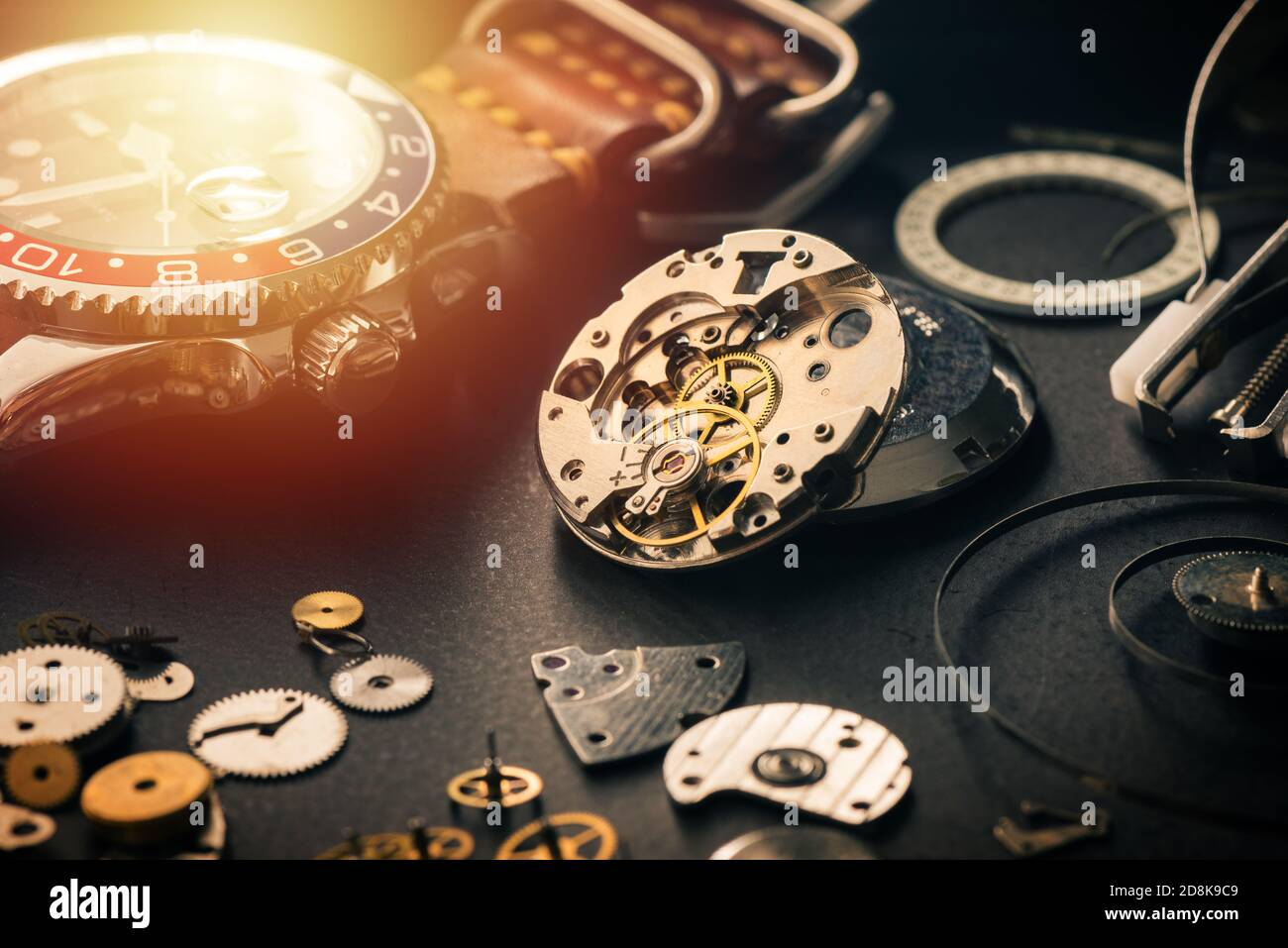 mechanical watch repairing concept. closeup the parts of mechanical ...