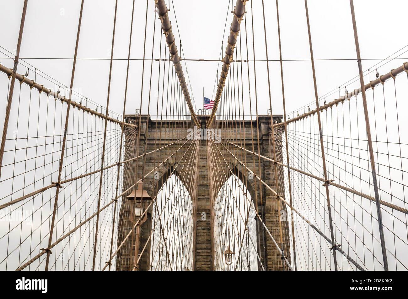 Low Angle View of Brooklyn Bridge Top on a Rainy Day in Manhattan, New ...