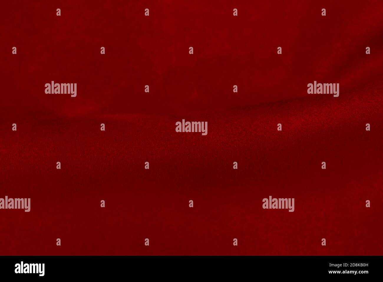 Red matte background of suede fabric, closeup. Velvet texture of ...