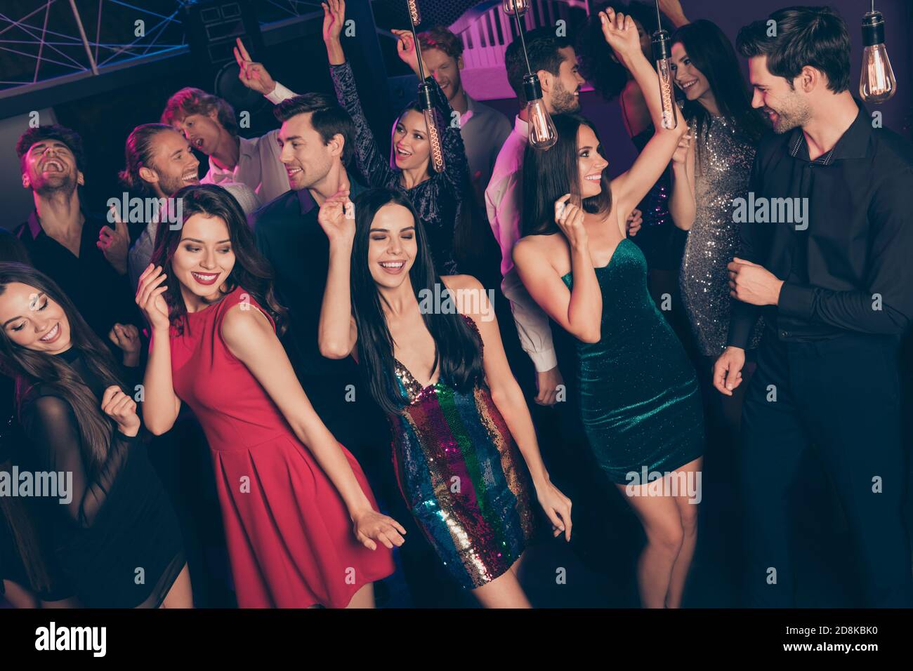 Photo portrait of wild crowd dancing at christmas party Stock Photo - Alamy