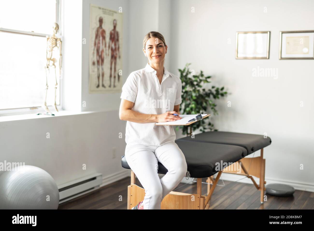 A Modern rehabilitation physiotherapy woman worker at job Stock Photo ...
