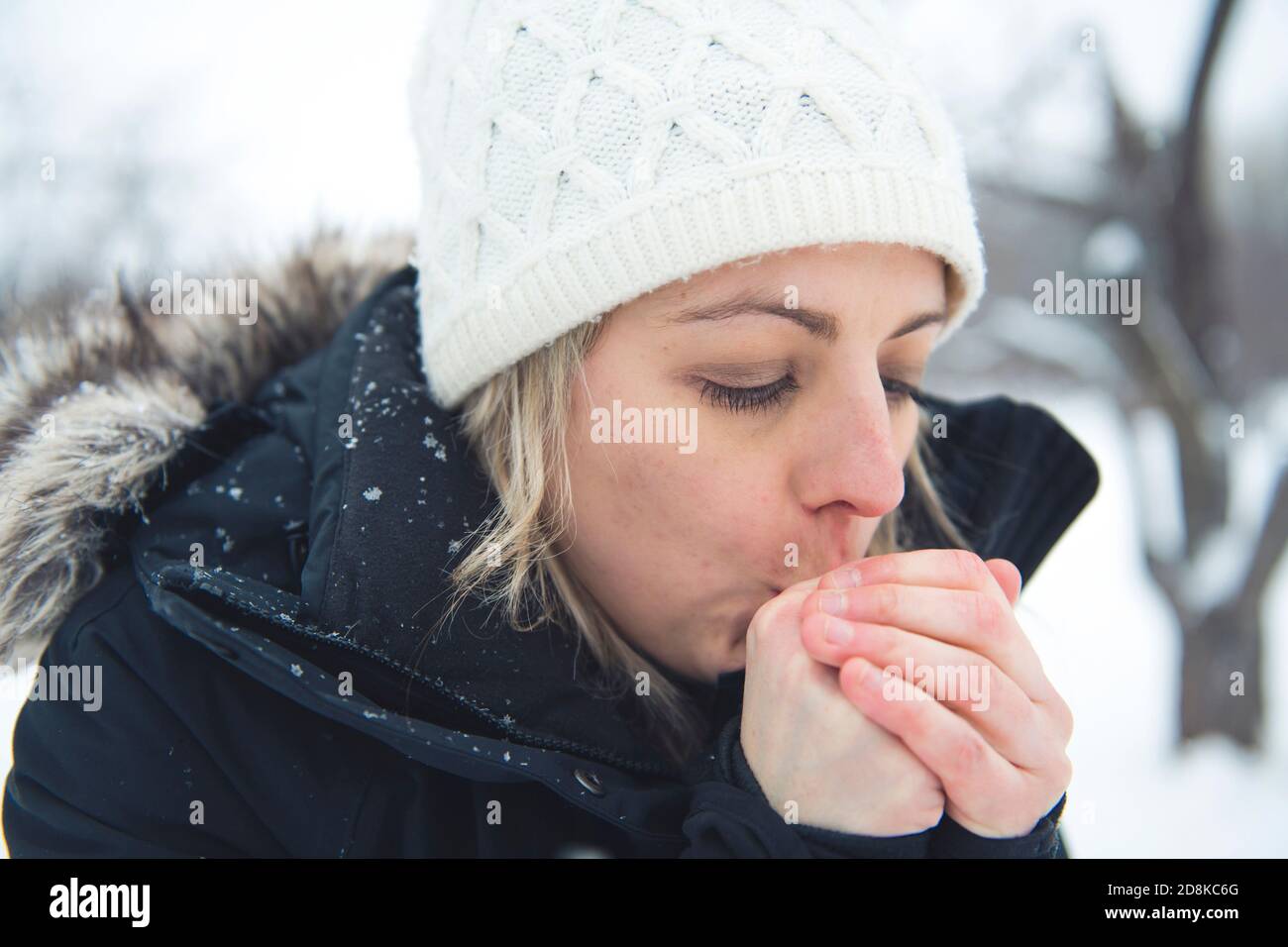 The girl with cold hand in winter season Stock Photo - Alamy