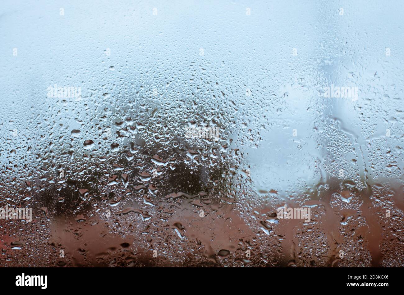 Water falling down glass surface hi-res stock photography and images ...