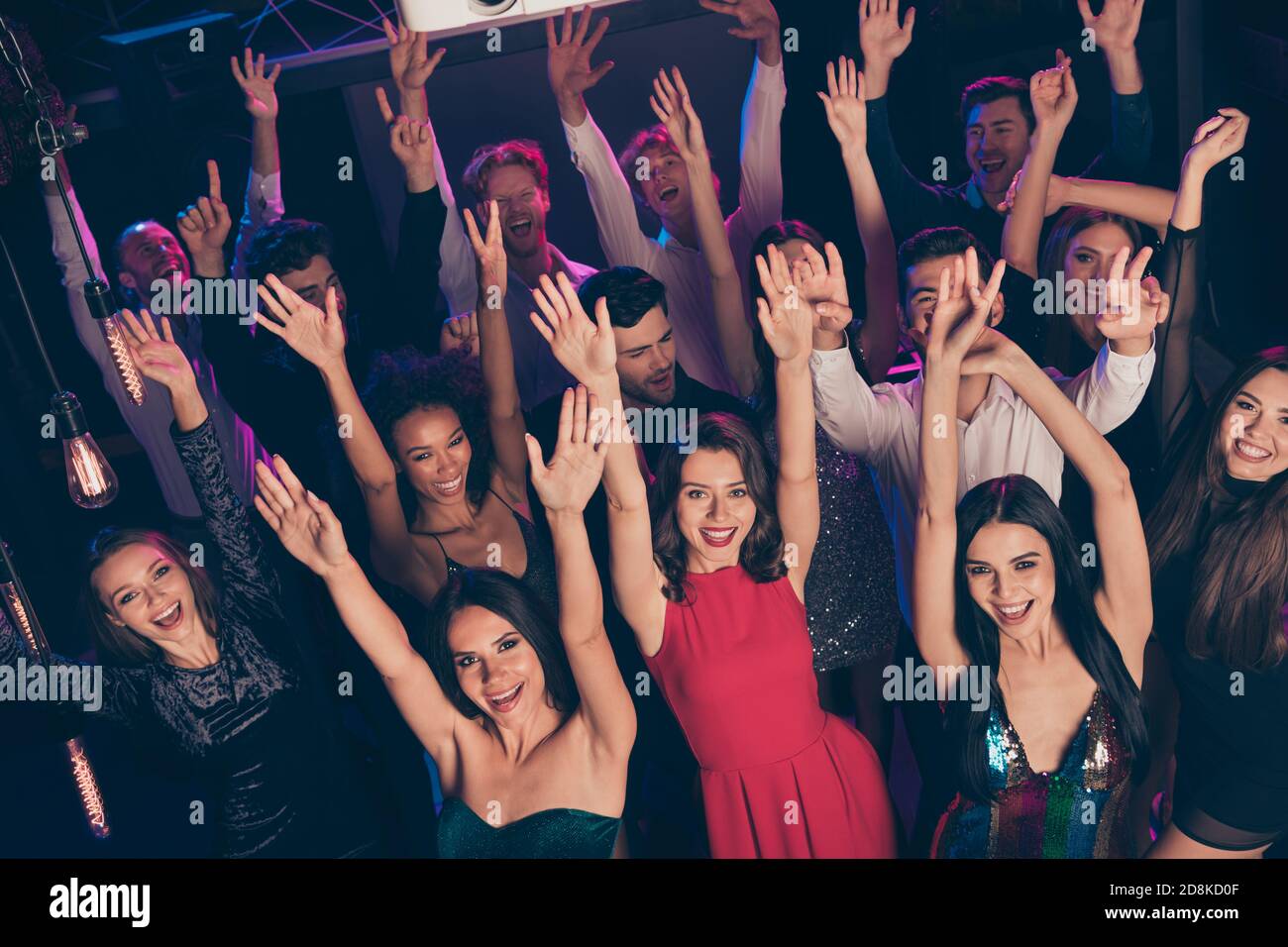 Attractive chic elegant cheerful crowd dancing rising hands up having ...