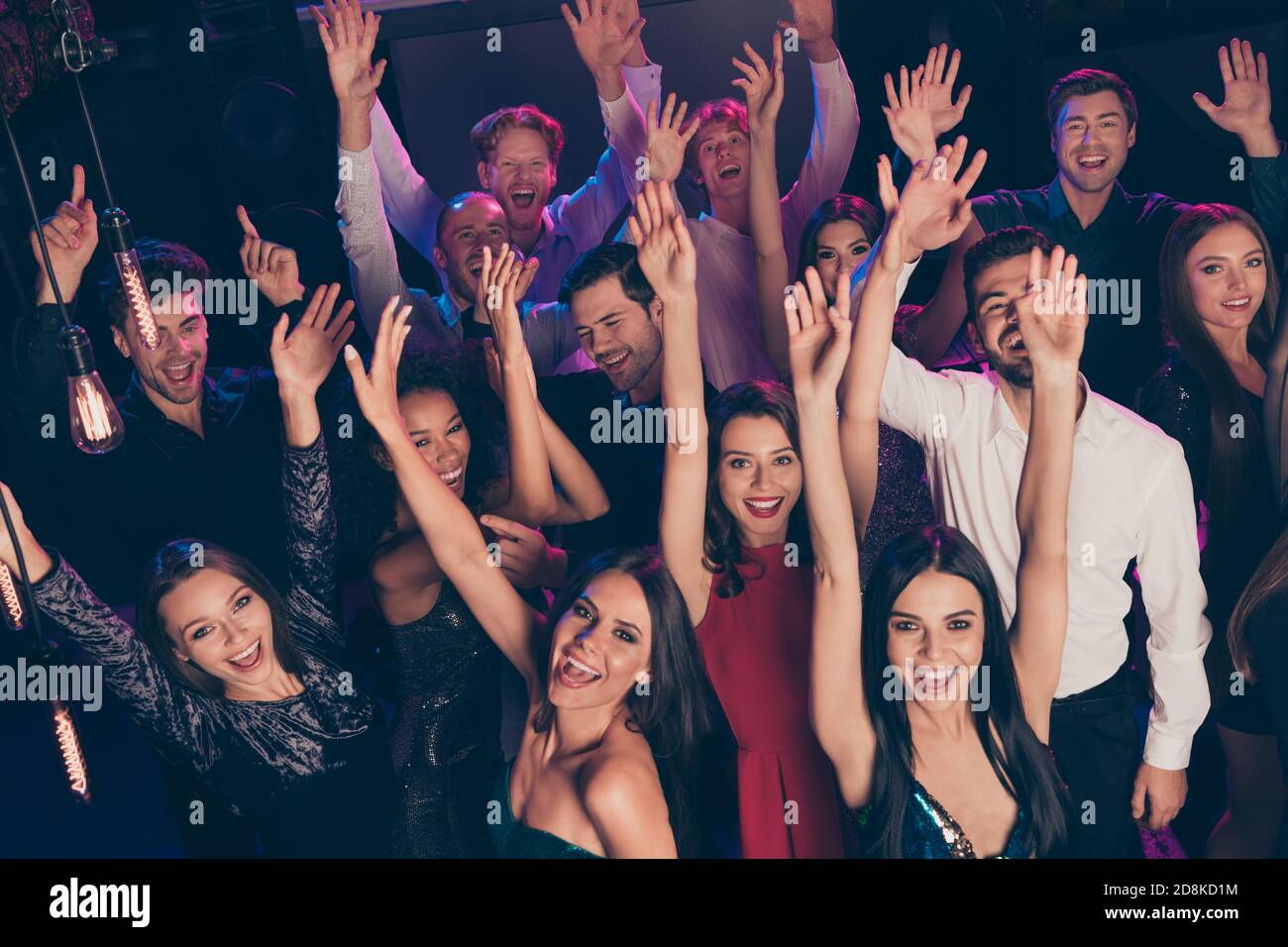 Attractive elegant cheerful crowd dancing rising hands up visiting ...
