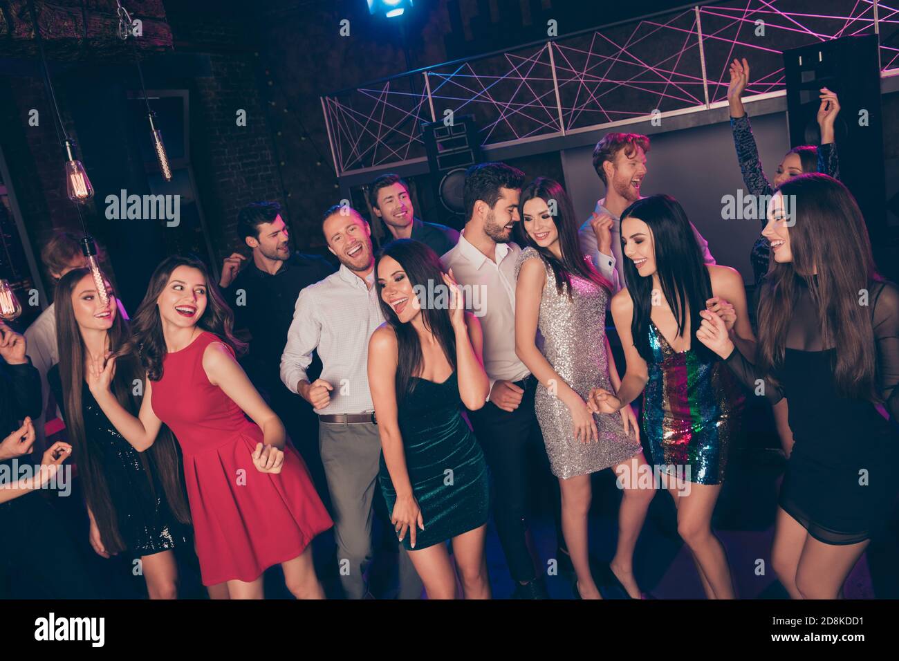 Nice attractive elegant cheerful friends dancing having fun visiting ...