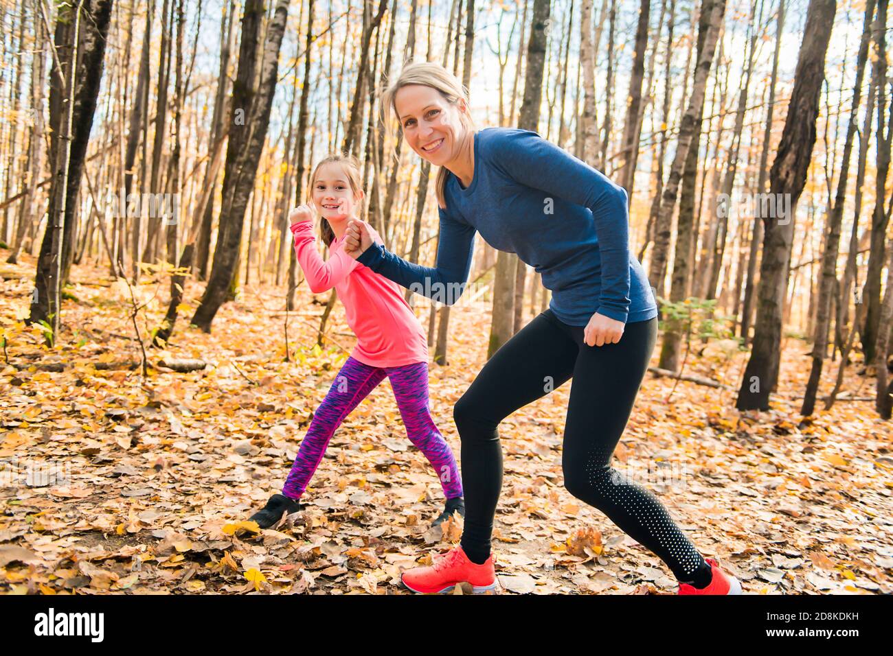 Healthy lifestyle mother and child running outdoor Stock Photo - Alamy