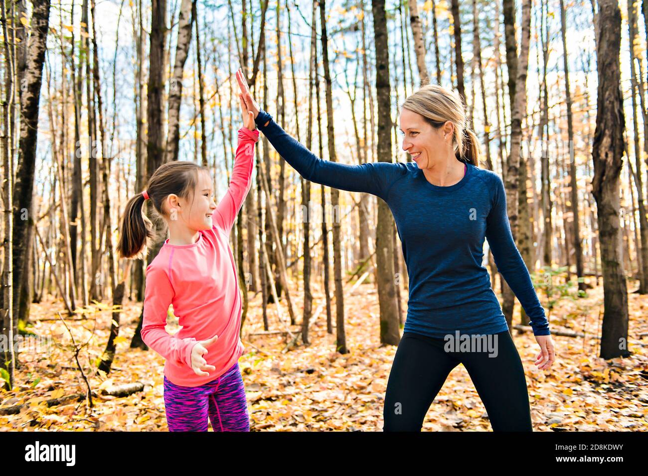 Healthy lifestyle mother and child running outdoor Stock Photo - Alamy