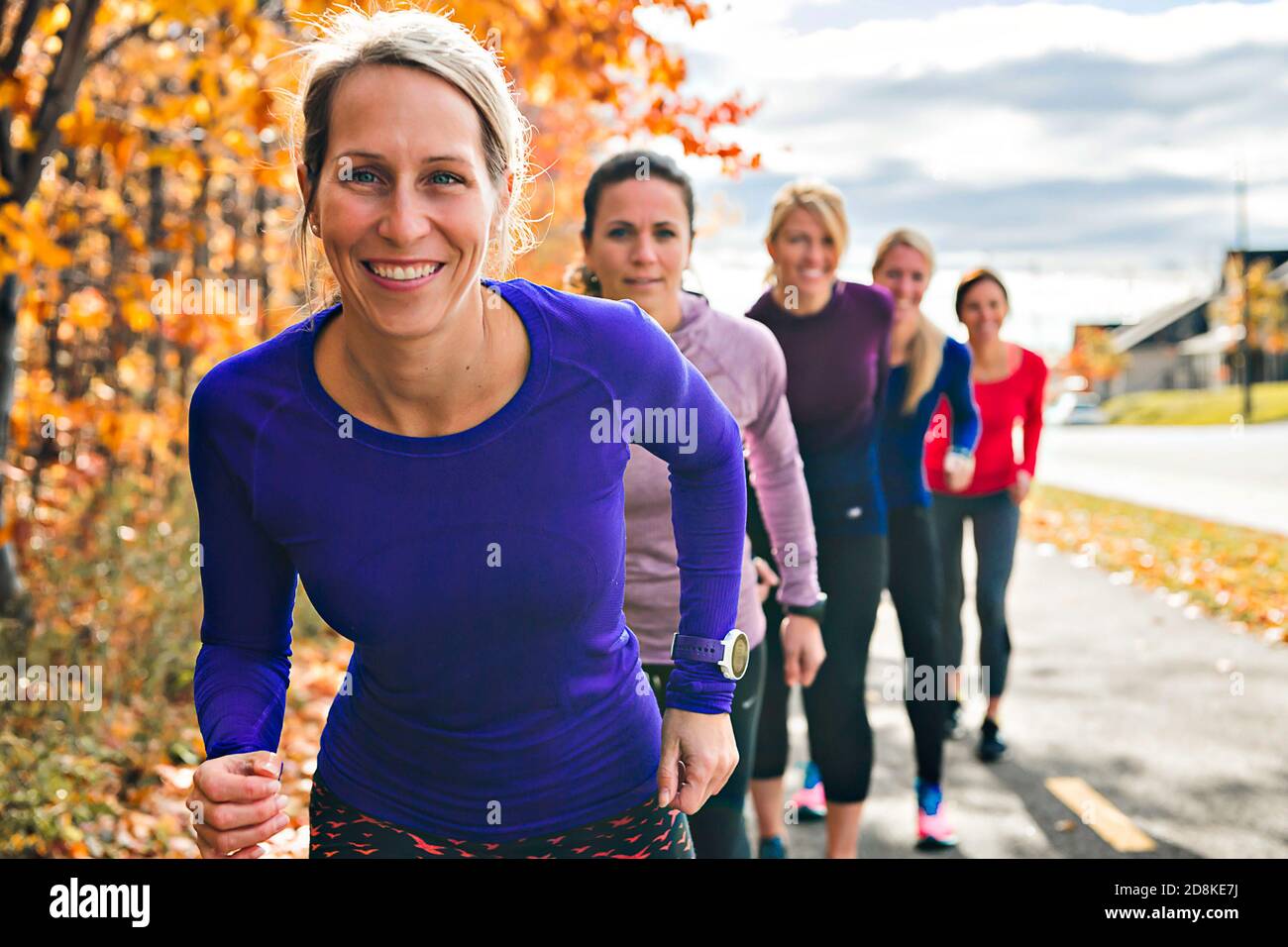 Group of friends jogging in nature hi-res stock photography and images ...