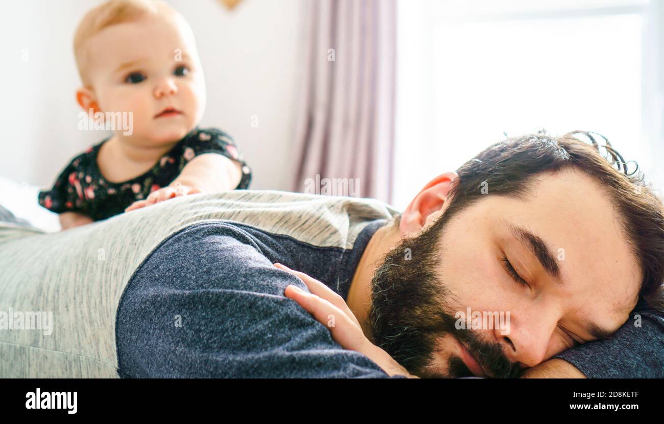 Father and daughter sleeping bed hi-res stock photography and images ...